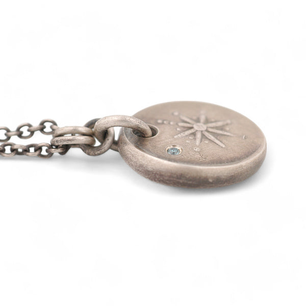 Round Sterling Silver Christmas Star Pendant with a Blue Diamond - John ...